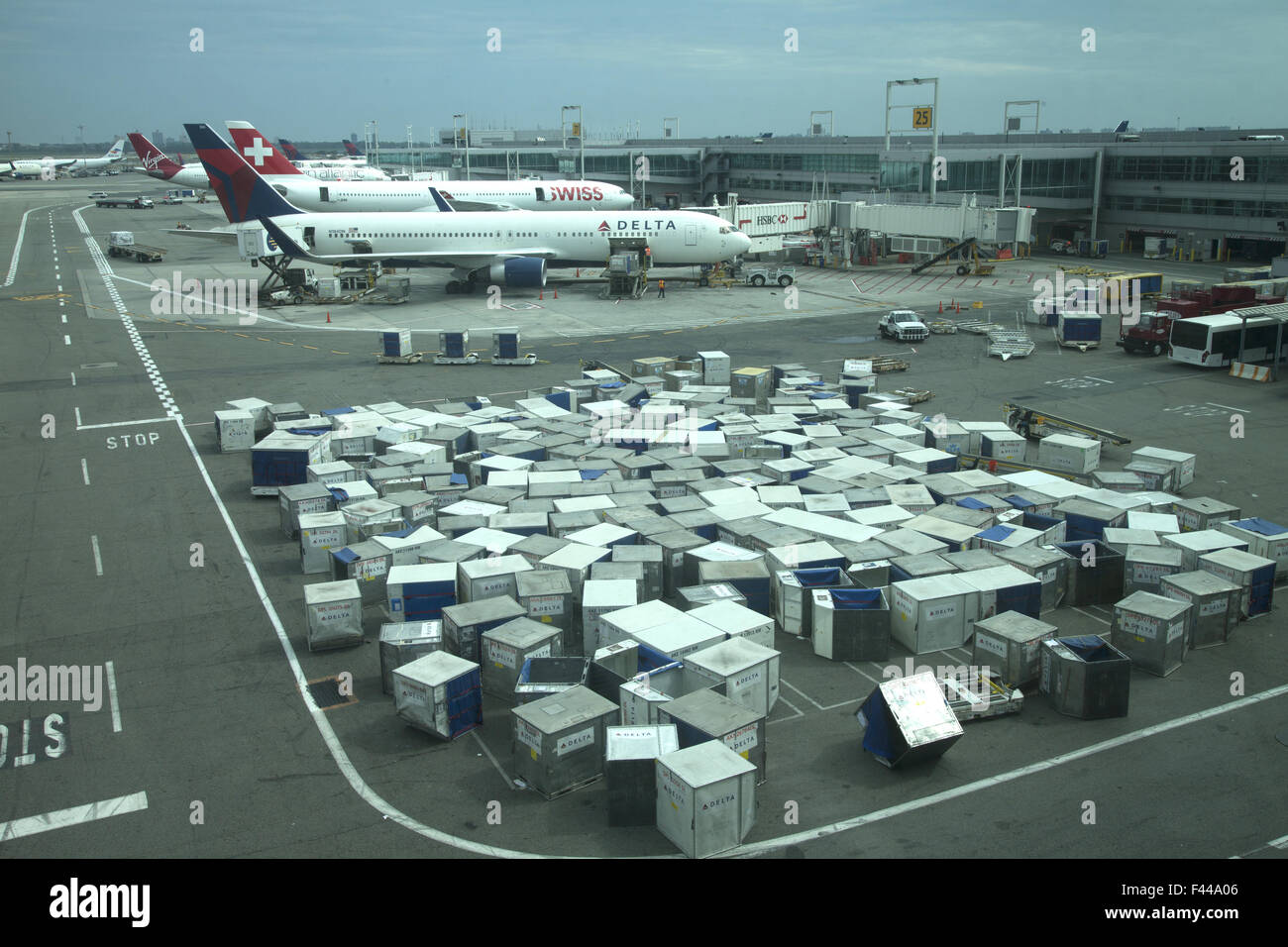 Mass of cargo containers that transport luggage and other cargo to and ...