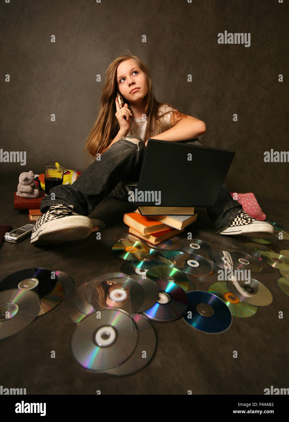 Girl with a computer Stock Photo - Alamy