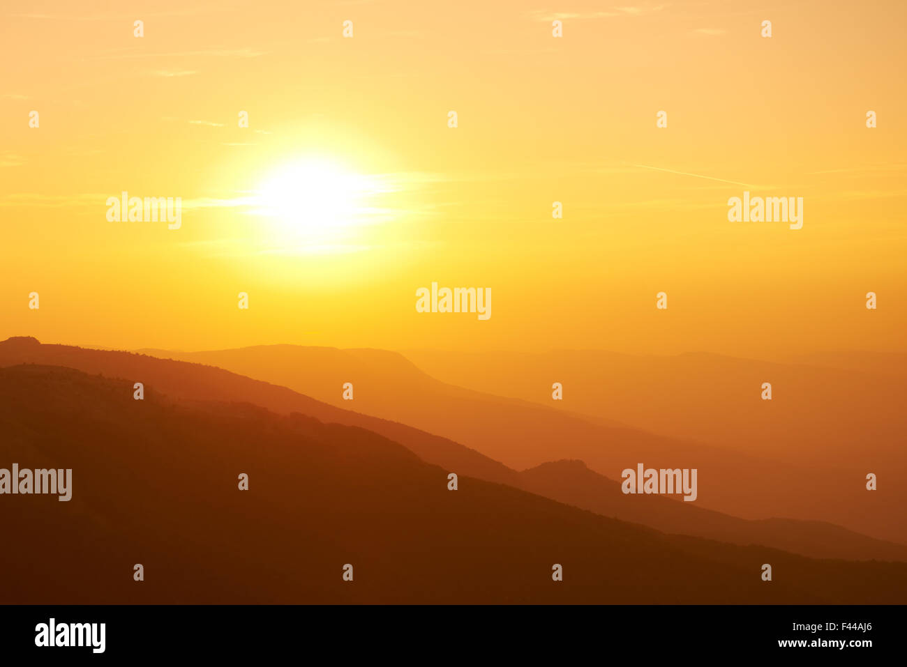 Beautiful sunset at the mountains Stock Photo - Alamy