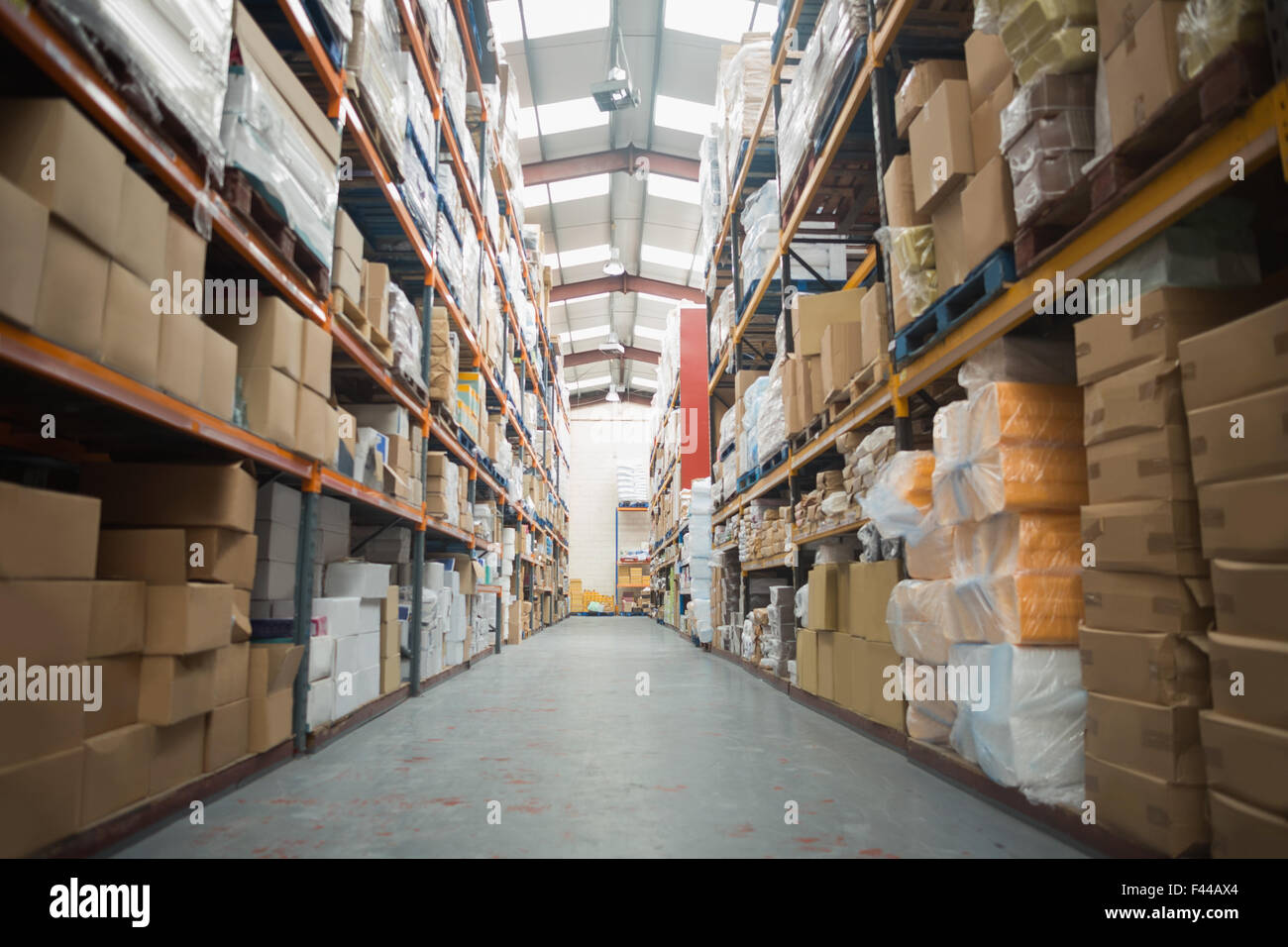 Shelves with boxes in warehouse Stock Photo - Alamy