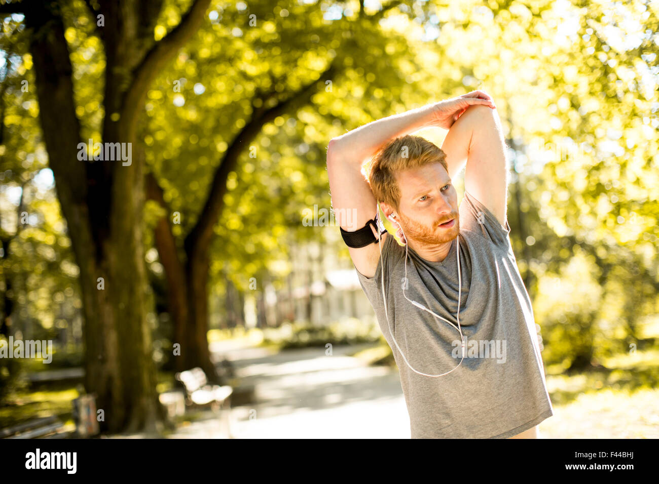 Young man resting outdoors Stock Photo - Alamy