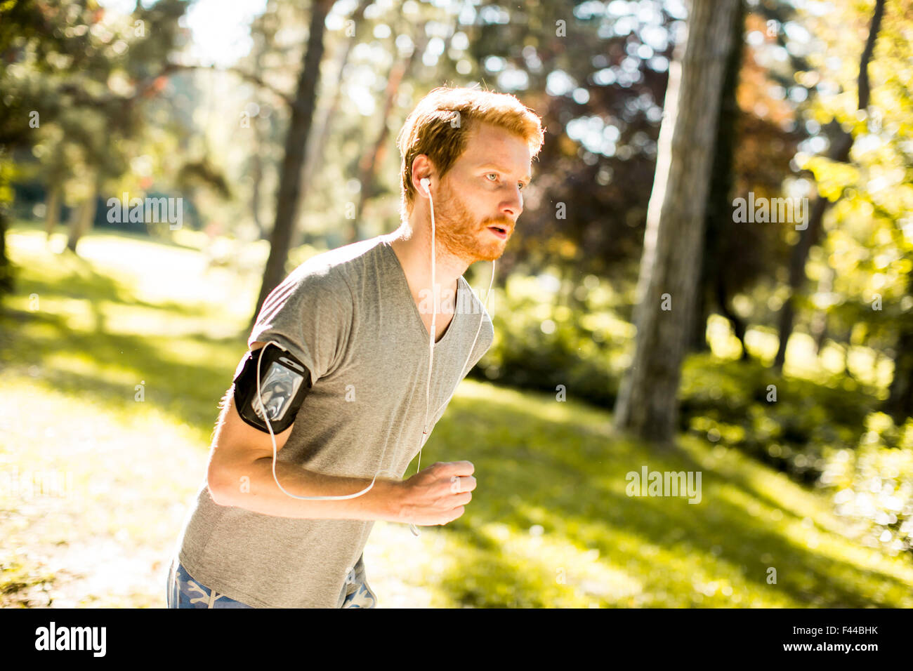 Young man resting outdoors Stock Photo - Alamy