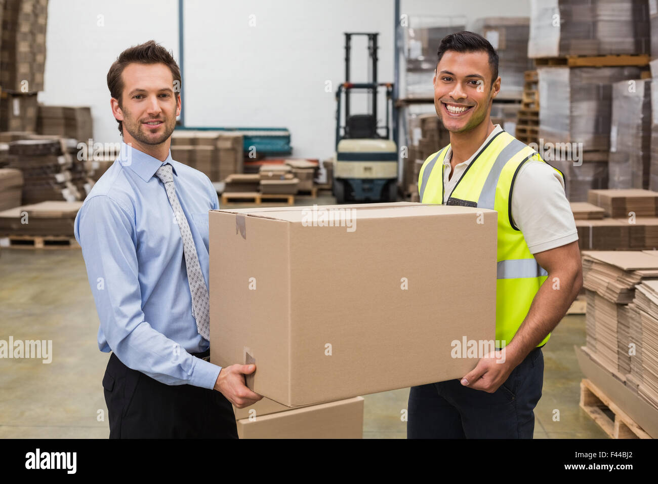Man passing box hi-res stock photography and images - Alamy