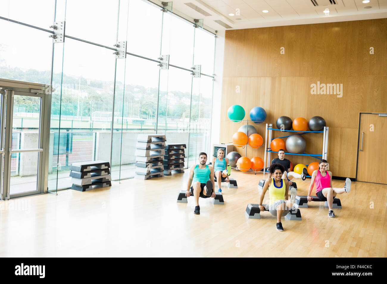 Fitness class exercising in the studio Stock Photo - Alamy