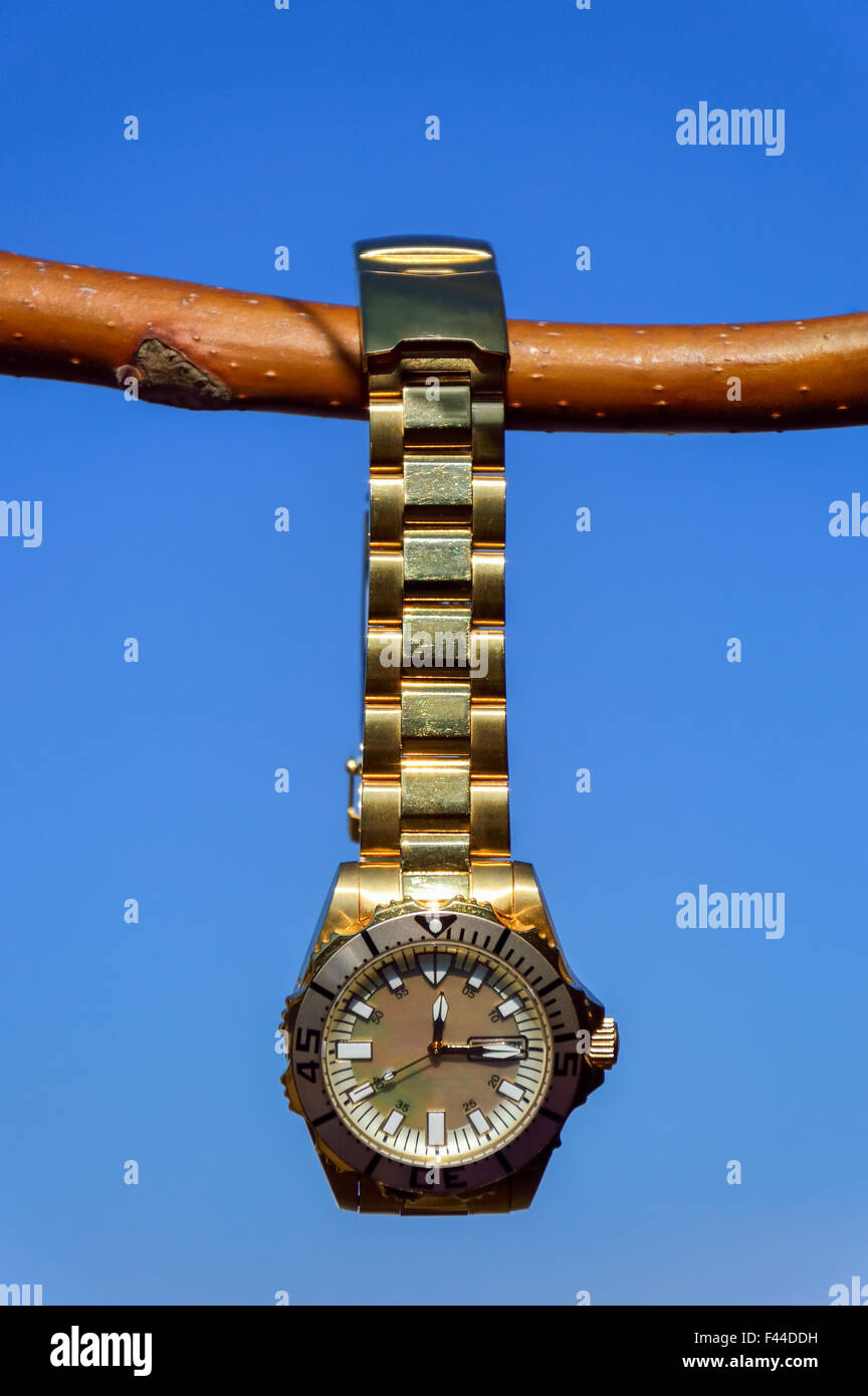 Watch for men gold Stock Photo - Alamy