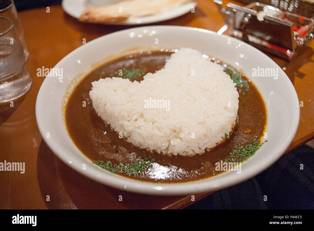 Cat shaped rice and curry on plate Stock Photo - Alamy
