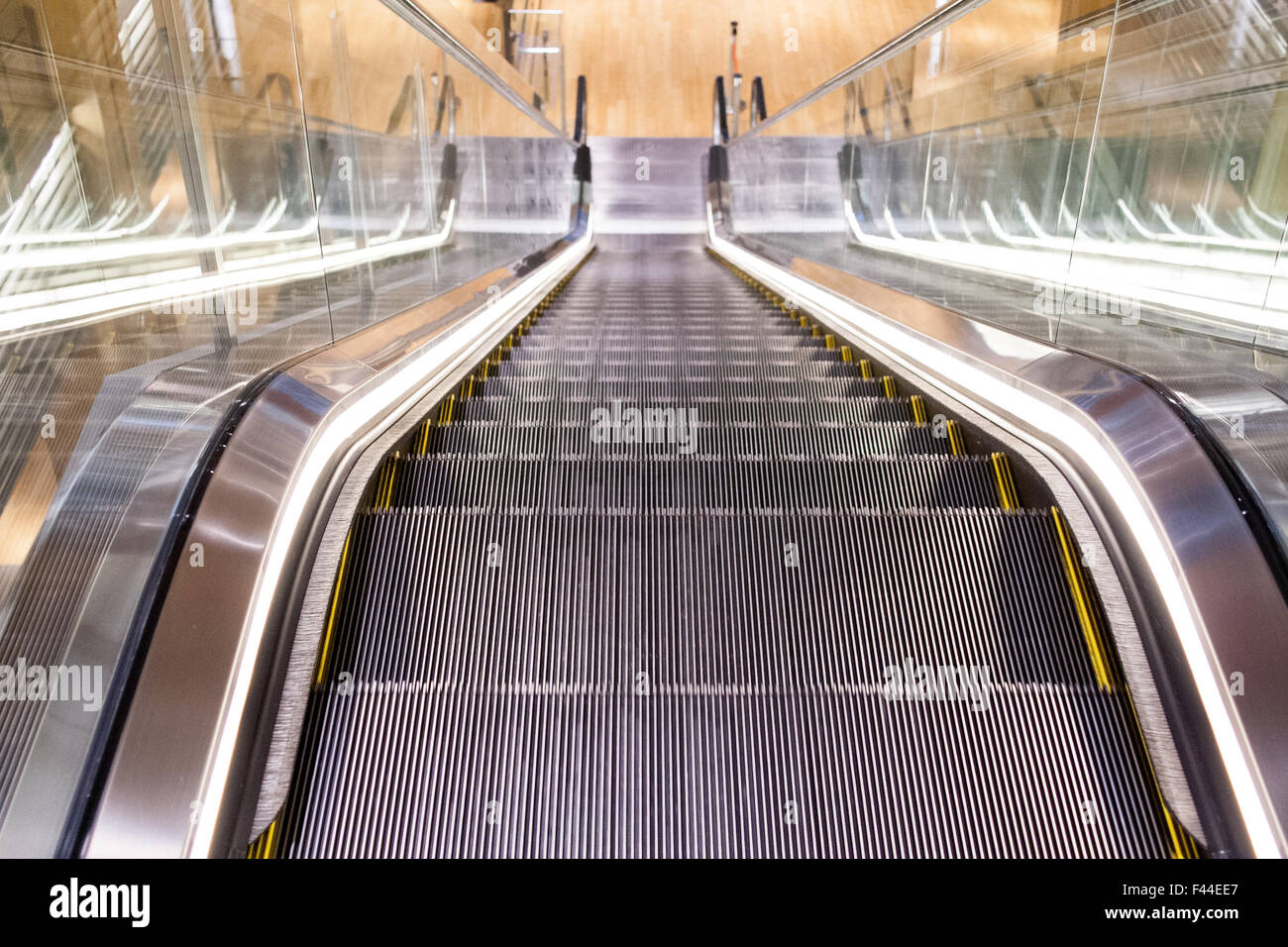 Escalator viewed from top down centered Stock Photo - Alamy