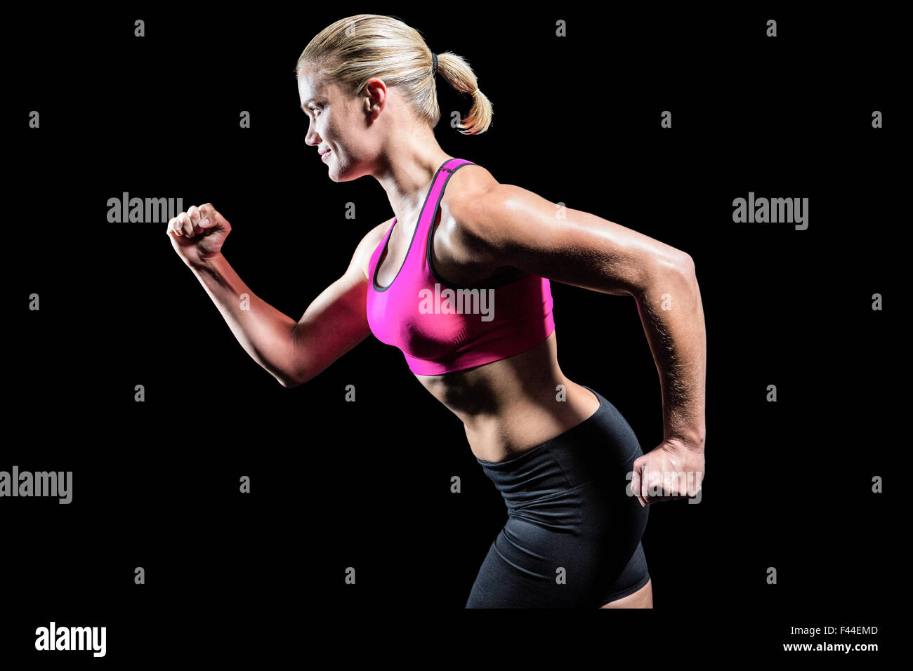 Muscular woman running hi-res stock photography and images - Alamy