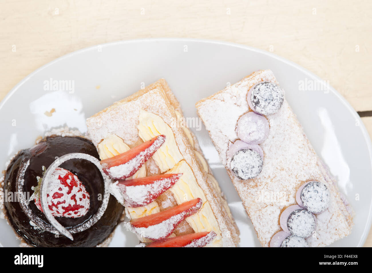 selection of fresh cream cake dessert plate Stock Photo - Alamy