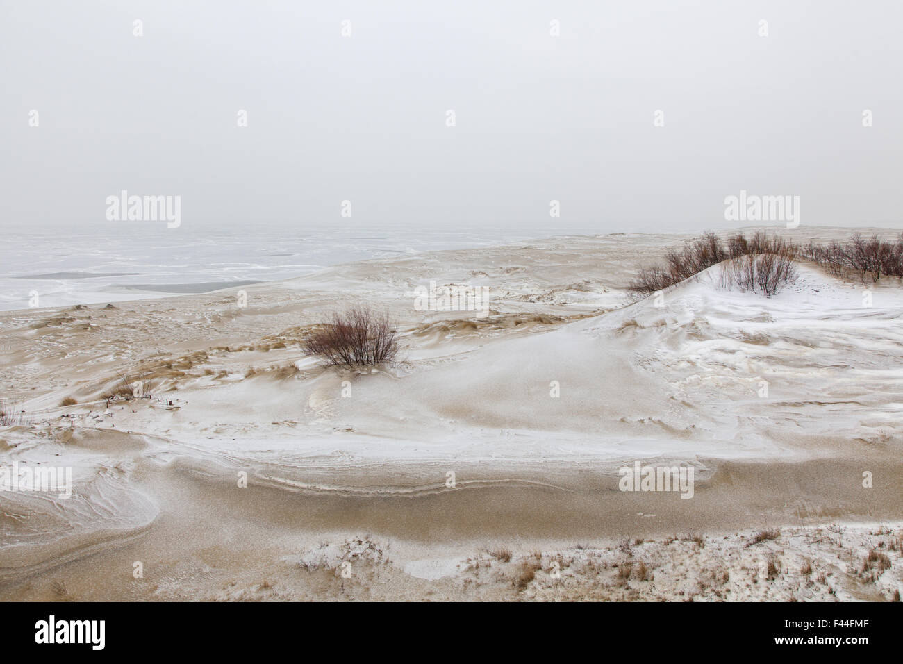 Snow covered sand dunes Stock Photo - Alamy
