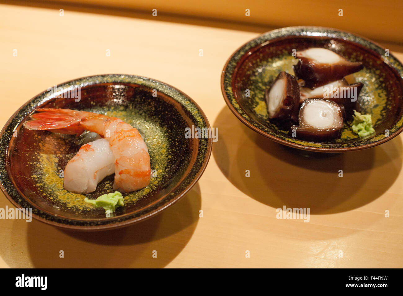 Ebi shrimp sashimi wasabi and tako octopus sushi Stock Photo - Alamy