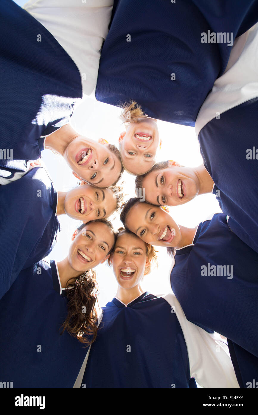 Pretty football players smiling at camera Stock Photo - Alamy