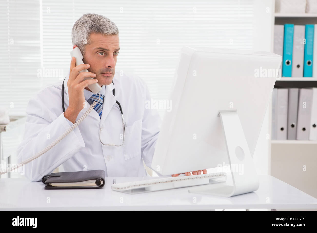 Phoning doctor hi-res stock photography and images - Alamy