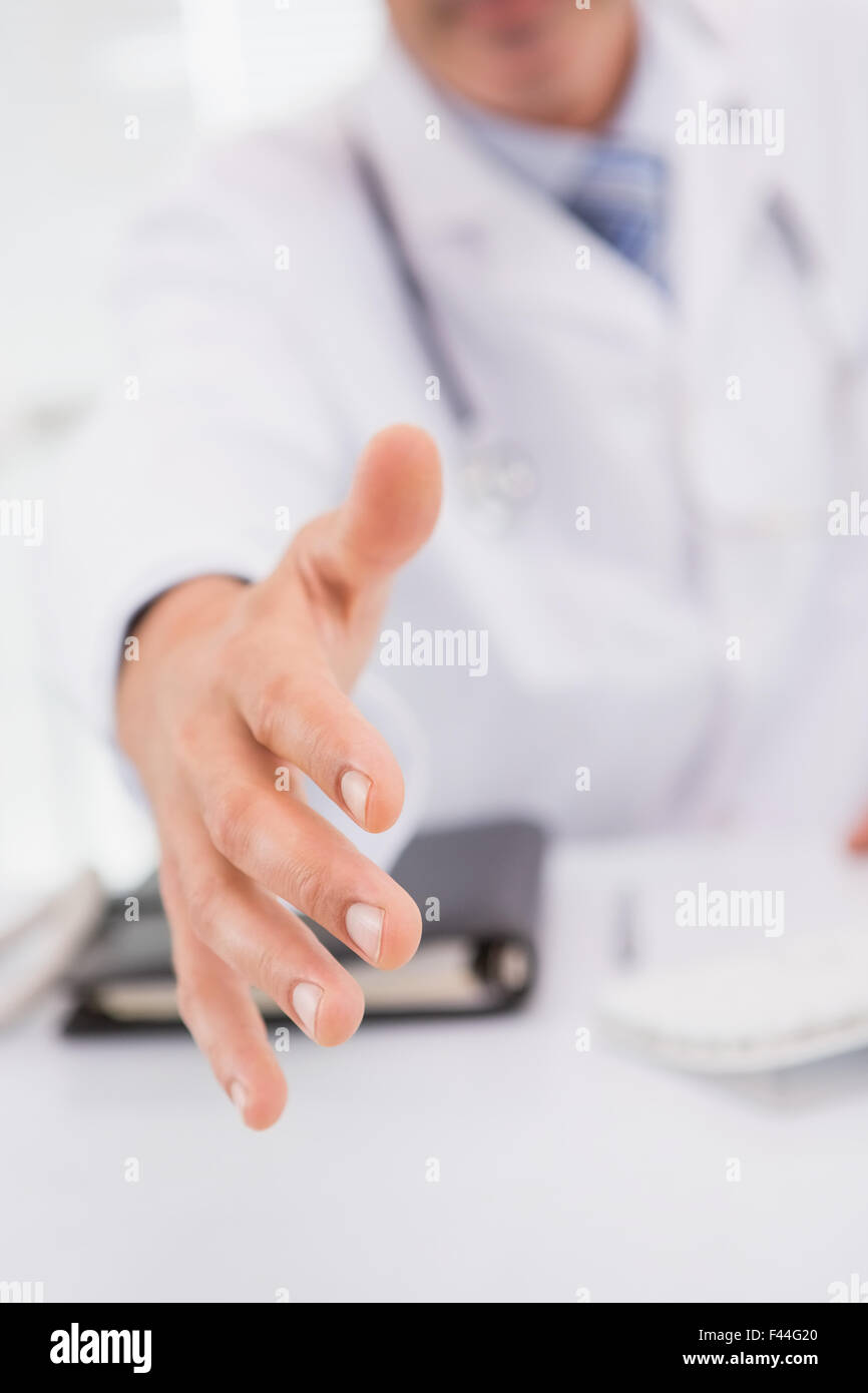 Happy doctor handshake at his patient Stock Photo - Alamy