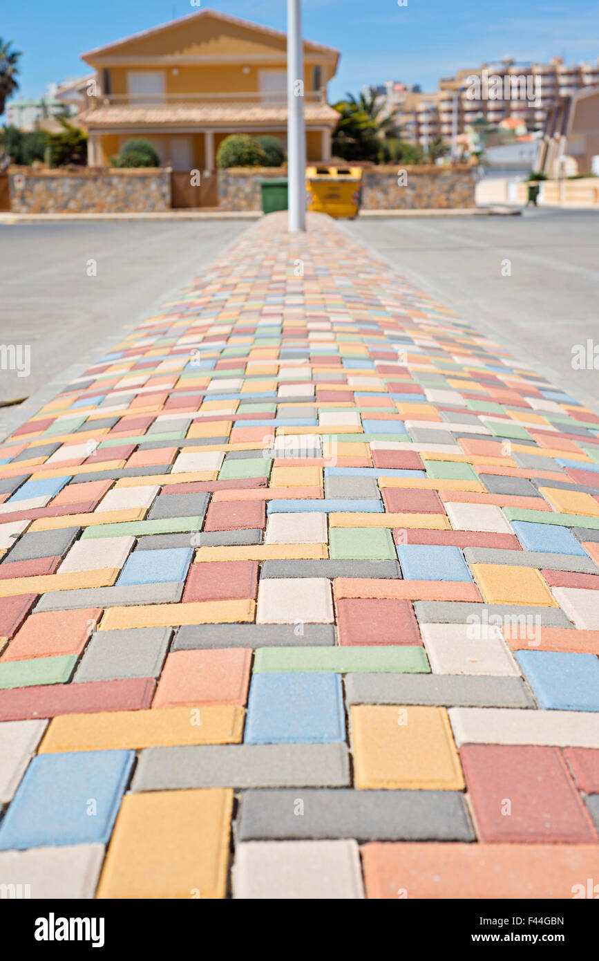 Multi colored vibrant paving stones Stock Photo - Alamy