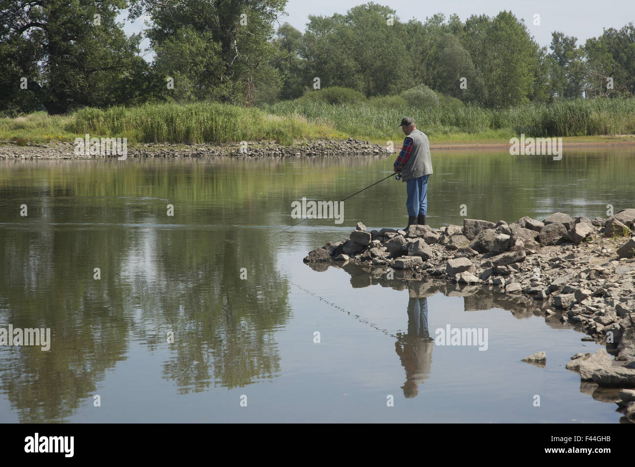 Man fishing on the River Odor the 2nd longest river in Poland Stock ...