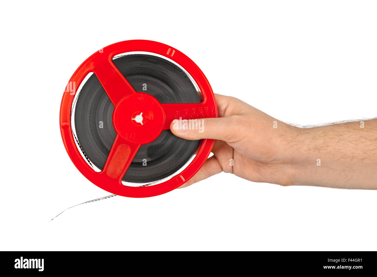 Cinema film reel in hand Stock Photo - Alamy