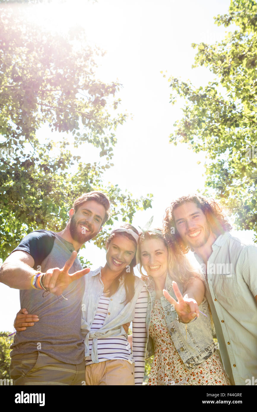 Happy friends smiling at camera Stock Photo - Alamy