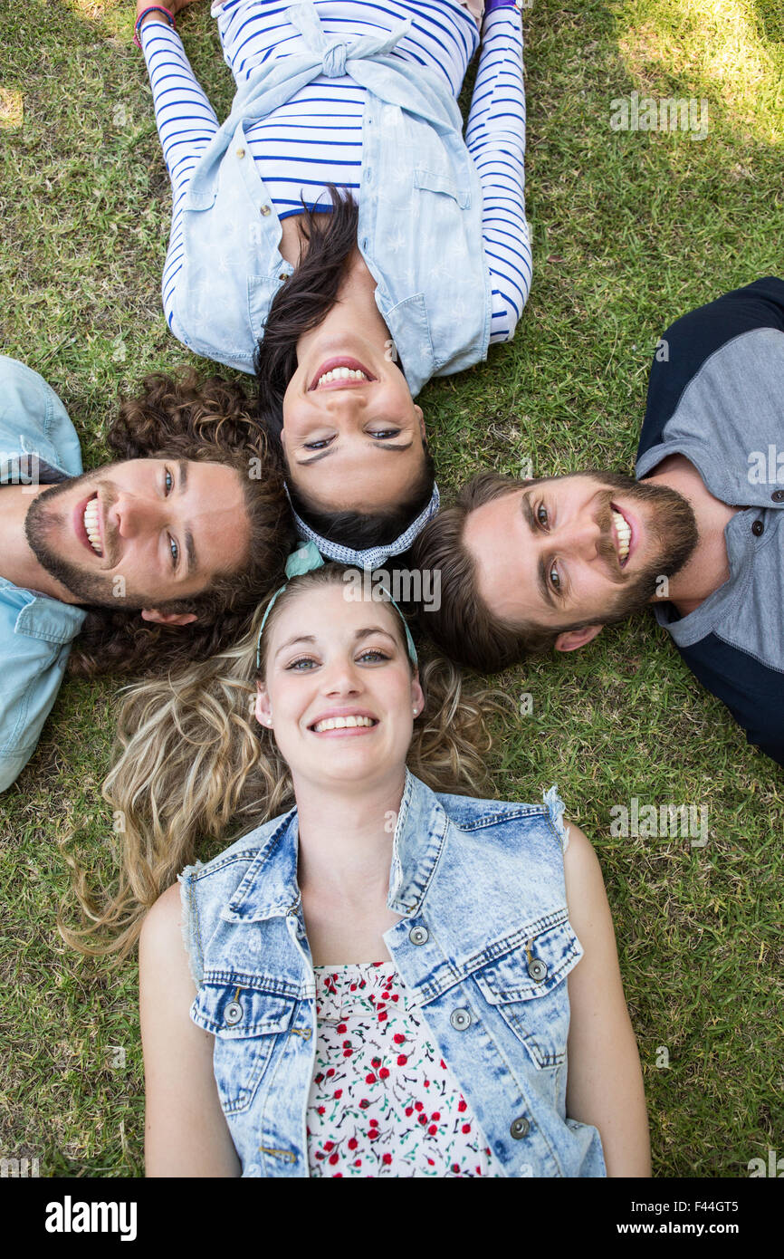 Happy friends smiling at camera Stock Photo - Alamy