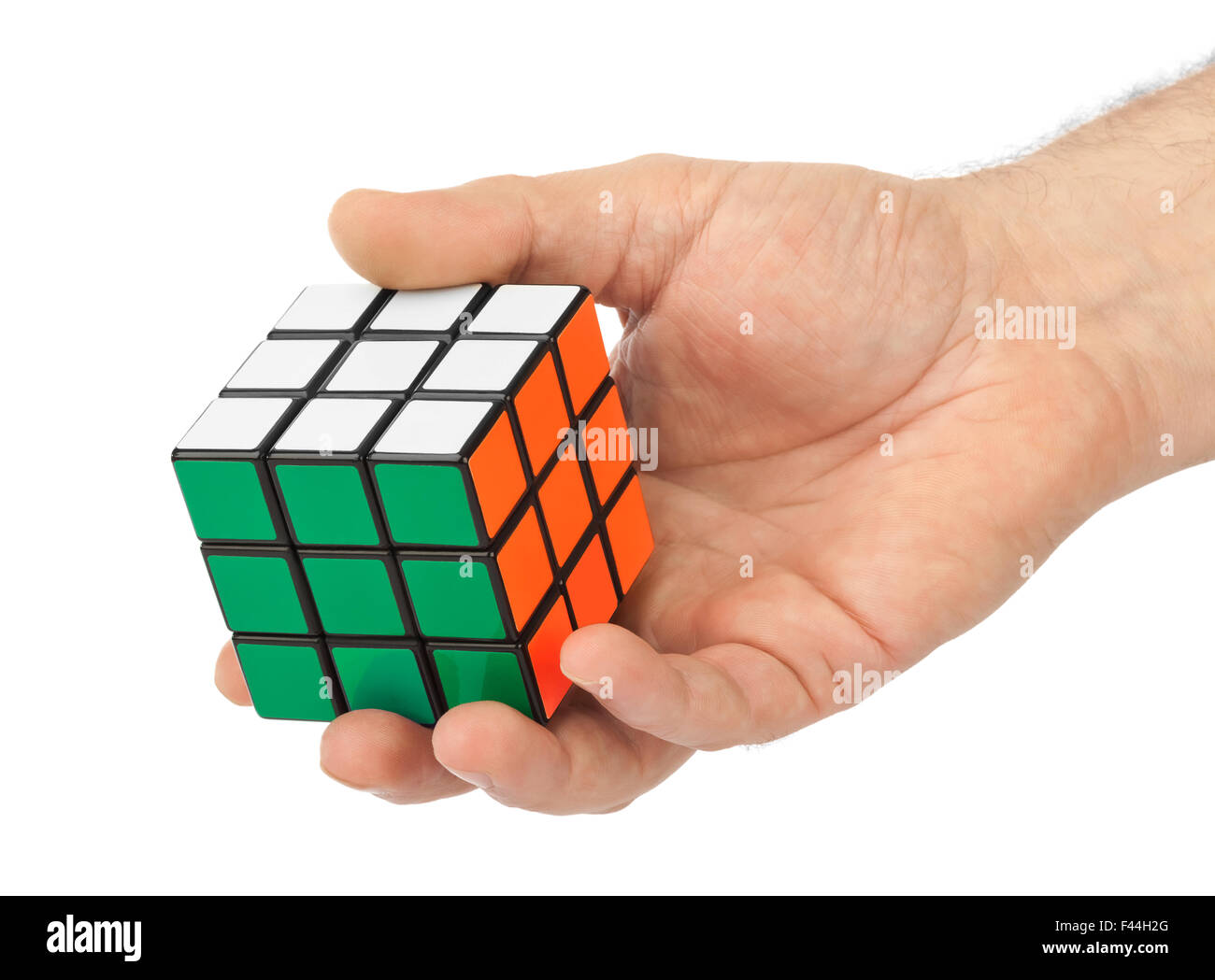Cube puzzle in hand Stock Photo - Alamy