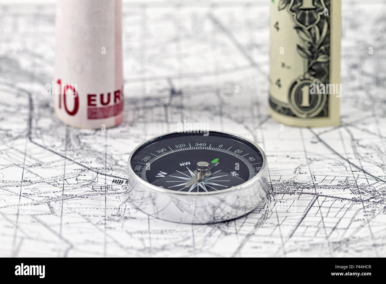 Compass Money High Resolution Stock Photography and Images - Alamy