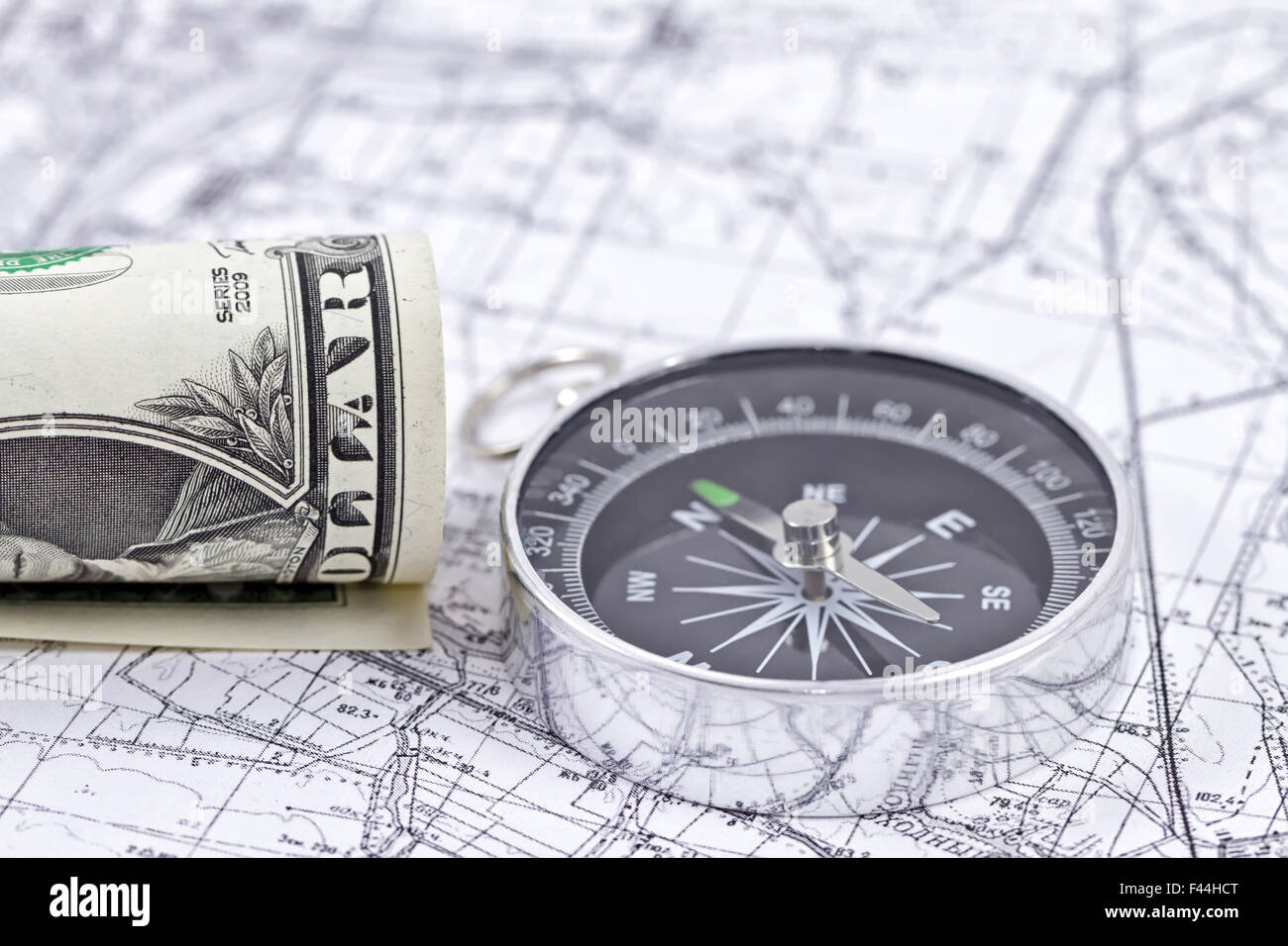 Compass Money High Resolution Stock Photography and Images - Alamy