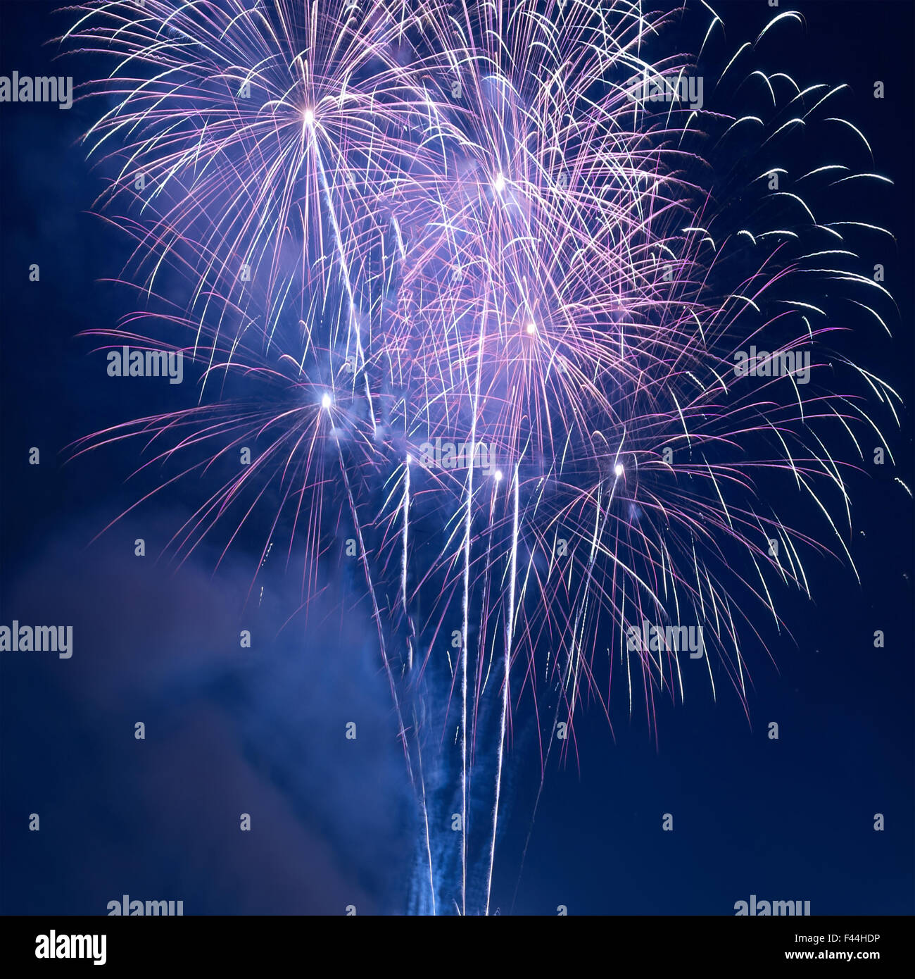 Blue colorful holiday fireworks hi-res stock photography and images - Alamy