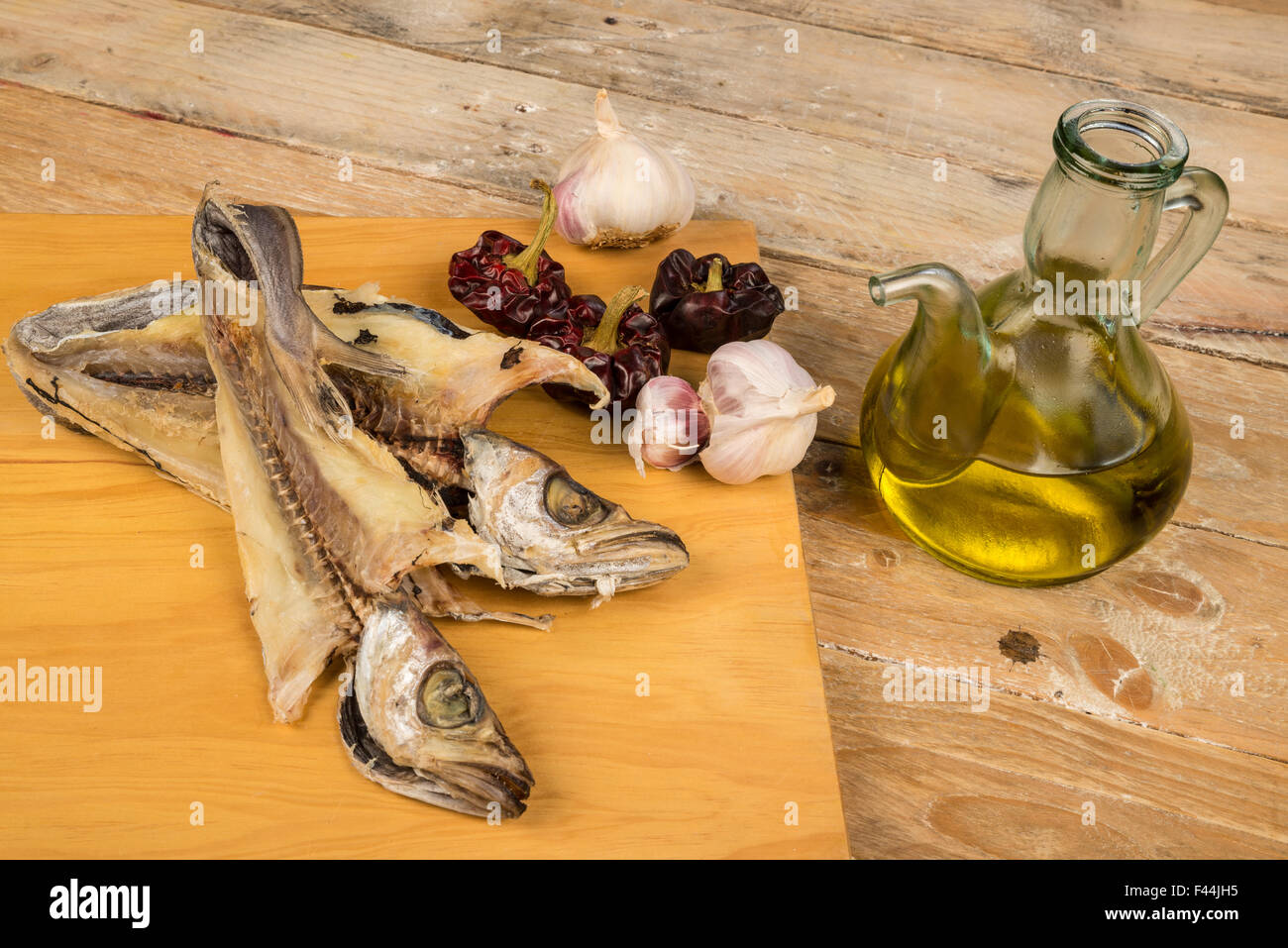 Salt dried whiting surrounded by several Mediterranean ingredients ...