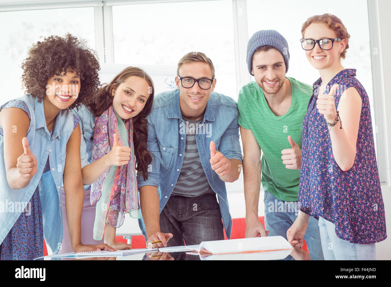 Fashion students working as a team Stock Photo - Alamy