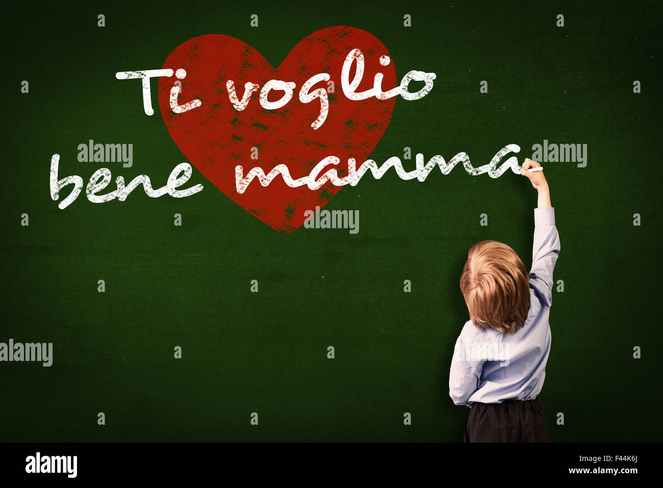 Composite image of cute pupil writing Stock Photo - Alamy