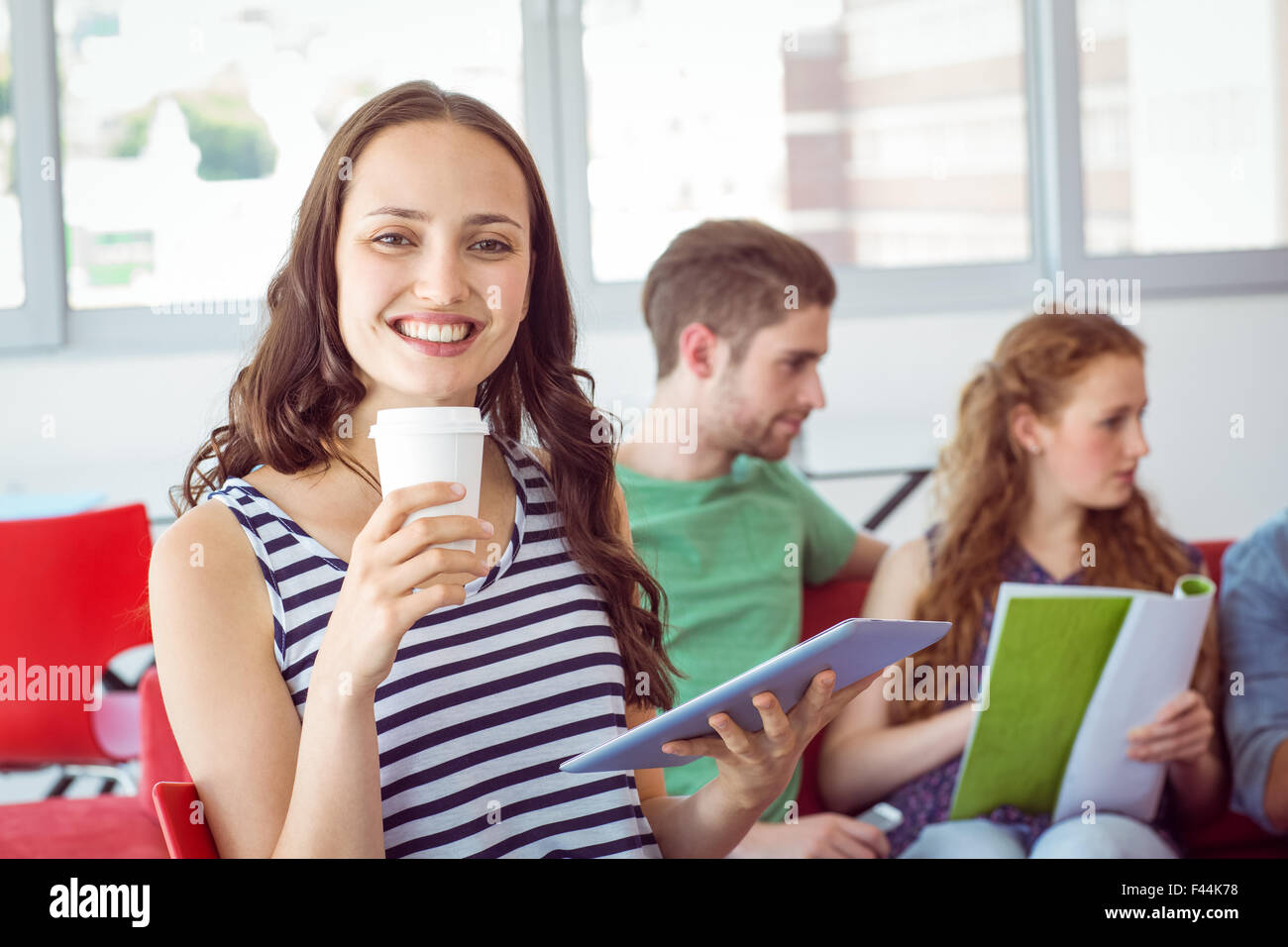 Fashion student smiling at camera Stock Photo - Alamy