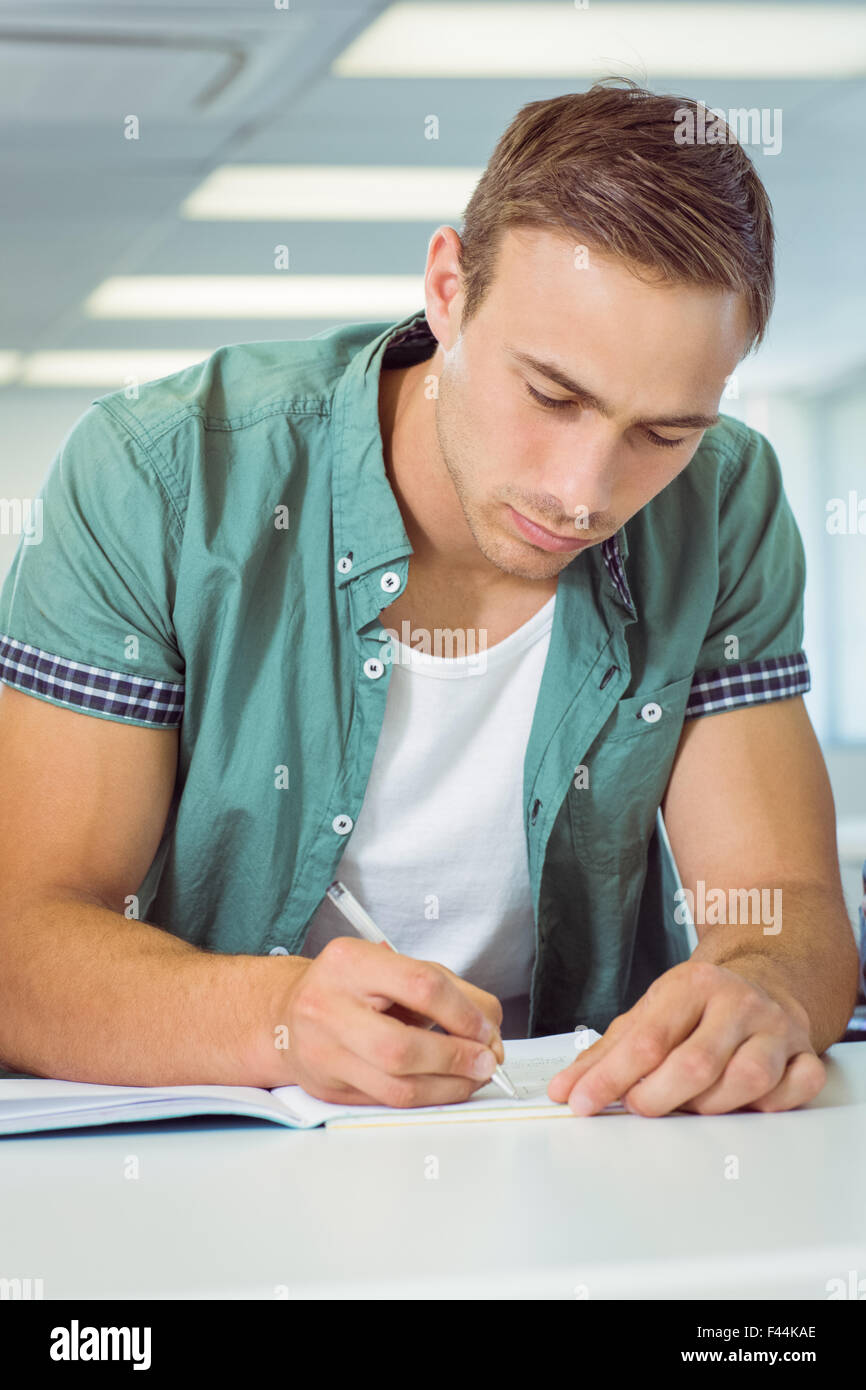 Male student taking notes in hi-res stock photography and images - Alamy