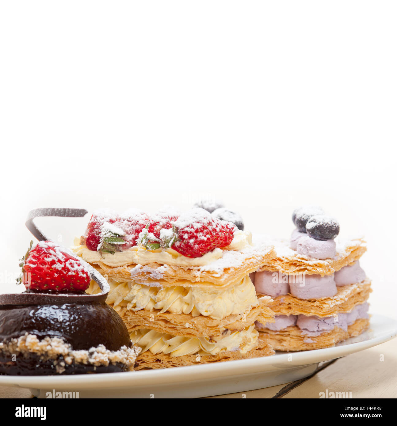 selection of fresh cream cake dessert plate Stock Photo - Alamy