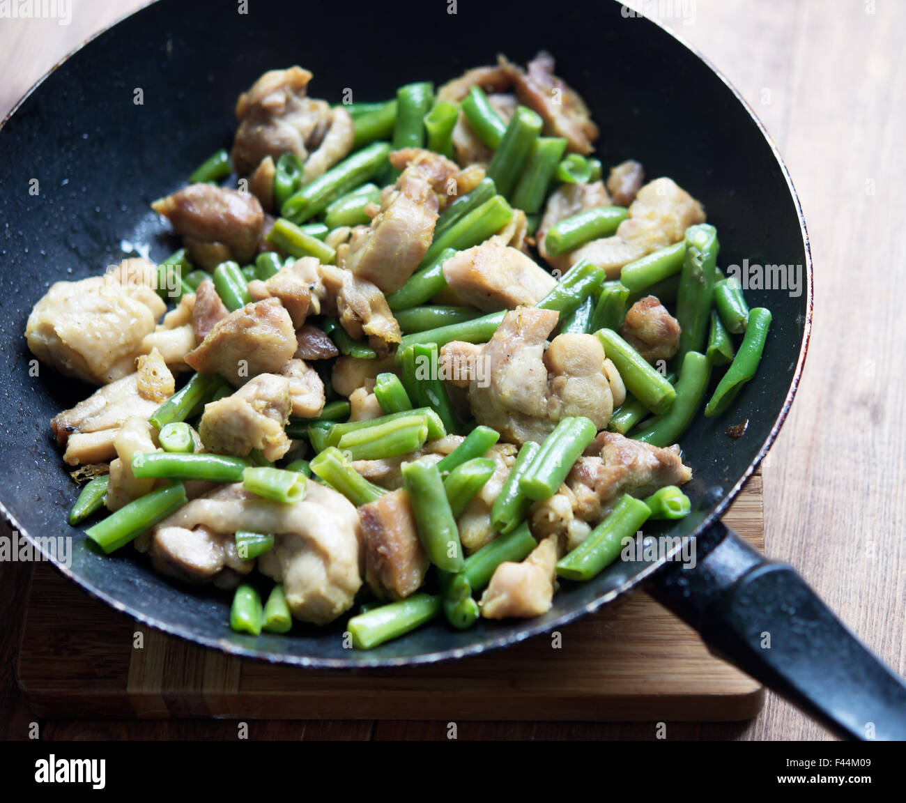 Chicken meat fried in frying hi-res stock photography and images - Alamy