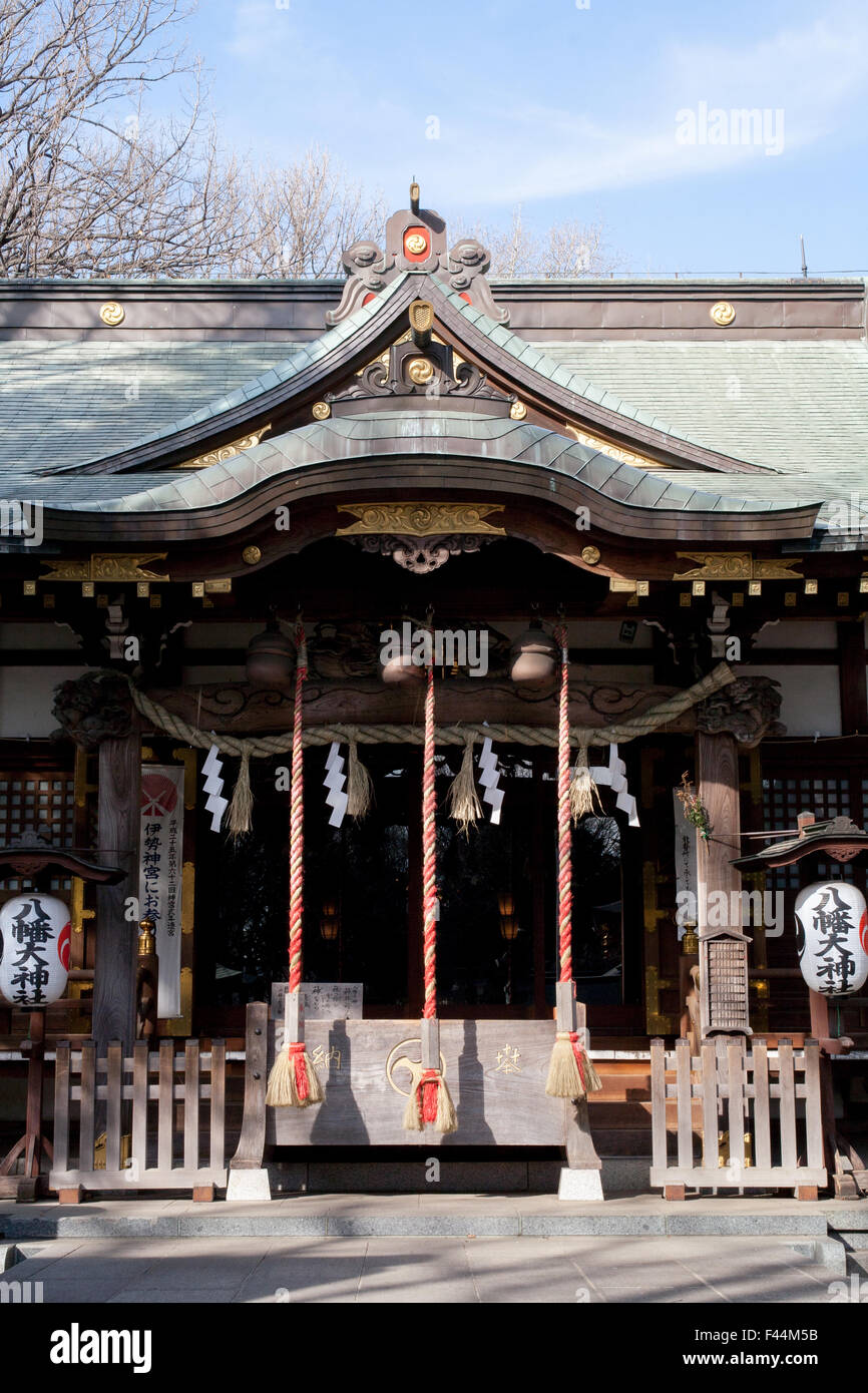 Japanese shinto shrine with rope bells portrait Stock Photo - Alamy