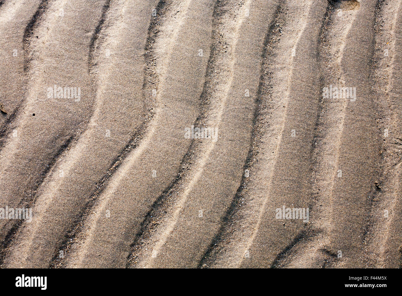 Sand bar waves in sand Stock Photo - Alamy
