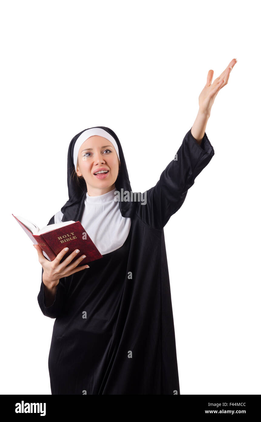 Pretty nun with Bible isolated on white Stock Photo - Alamy