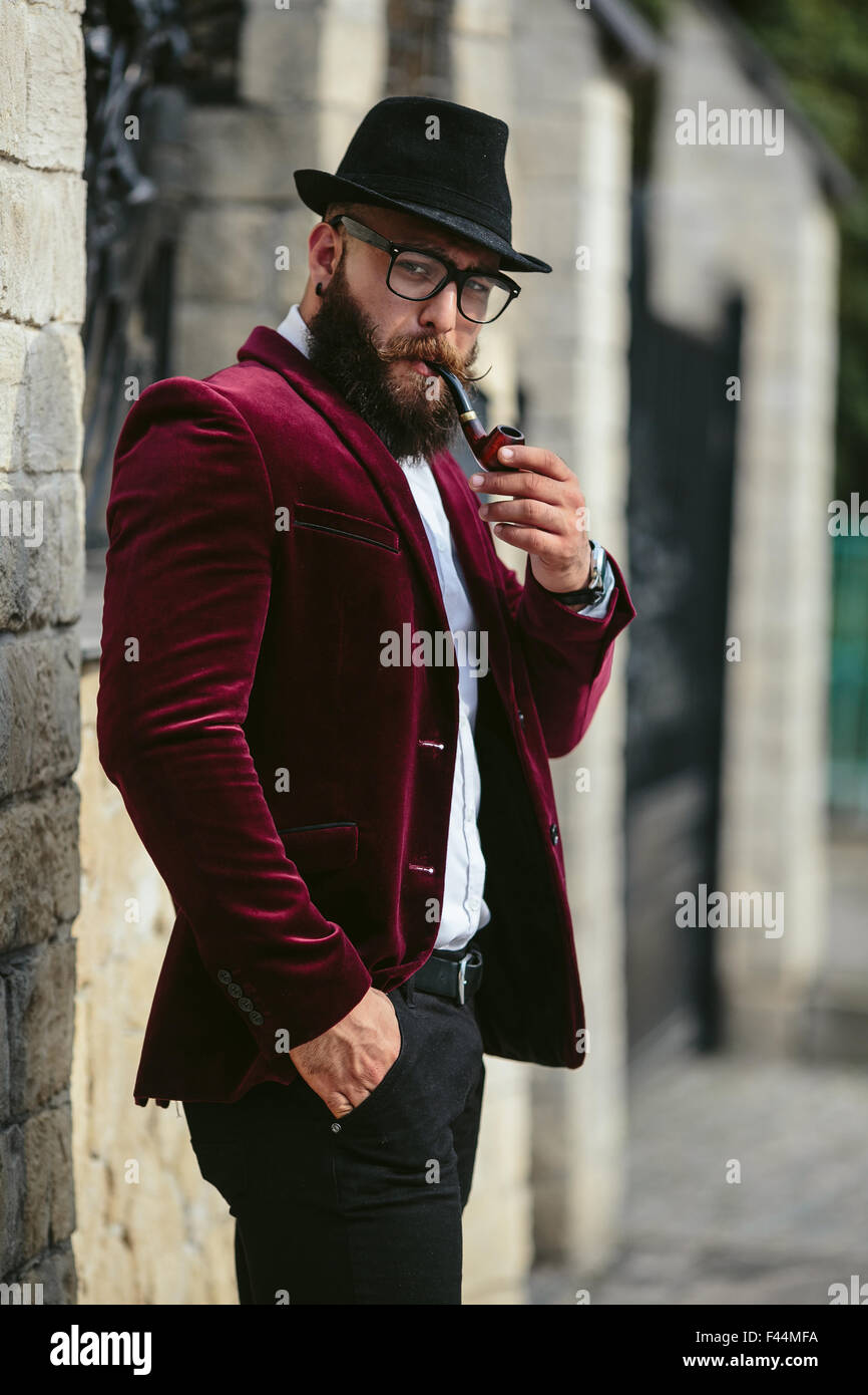 rich man with a beard, thinking about business Stock Photo - Alamy