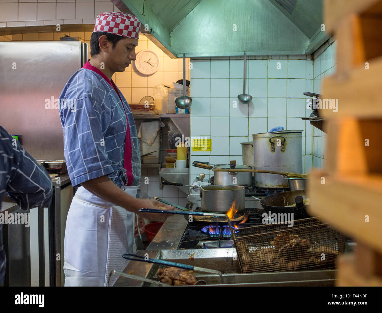 Chef working in japanese restaurant hi-res stock photography and images ...