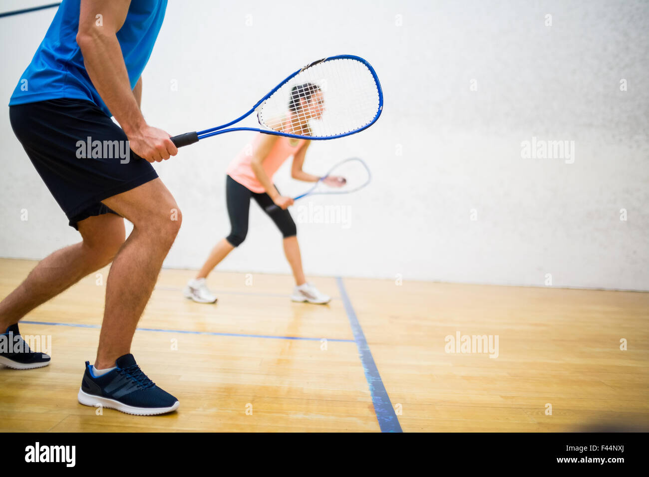 Woman about to serve the ball Stock Photo - Alamy