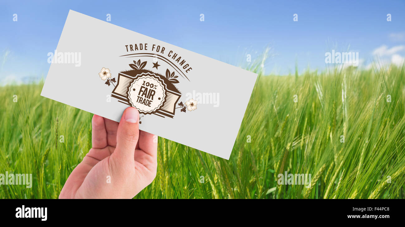 Composite image of hand showing card Stock Photo - Alamy