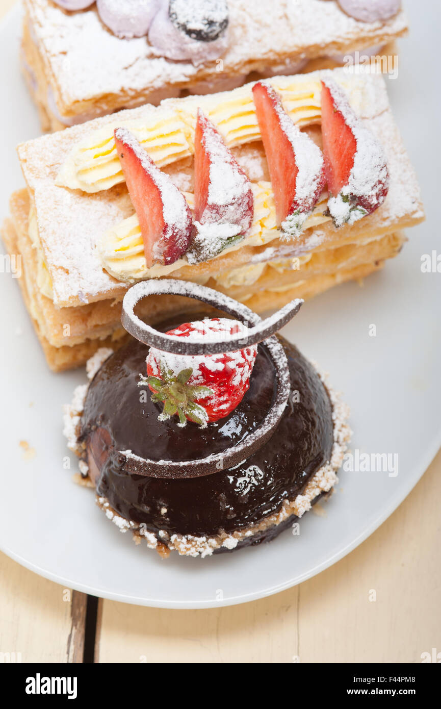 selection of fresh cream cake dessert plate Stock Photo - Alamy