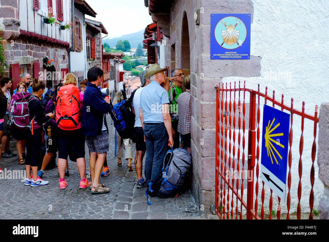 Pilgrims in front of the office of the association "Les amis du chemin ...