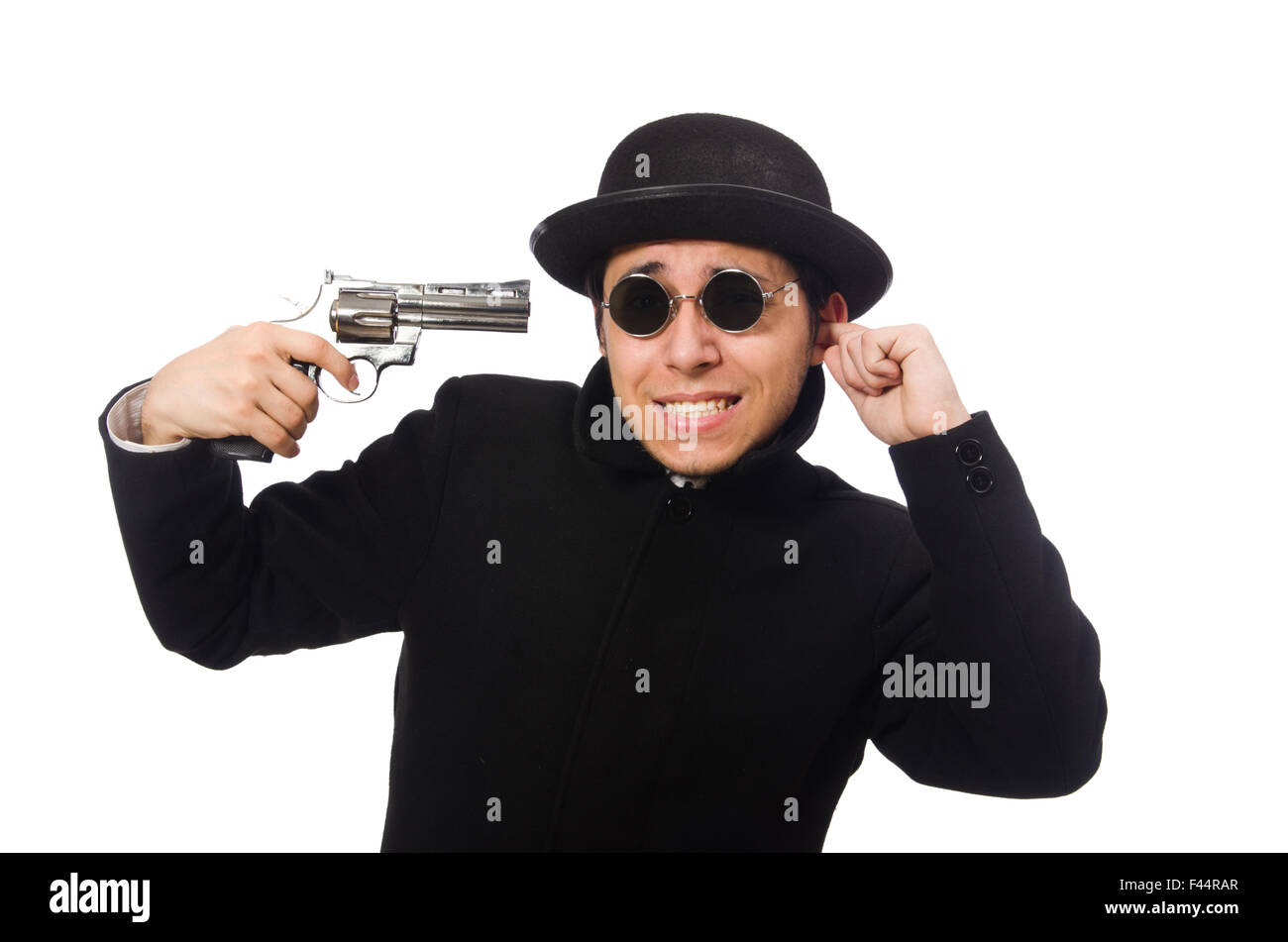 Young man with gun isolated on white Stock Photo - Alamy