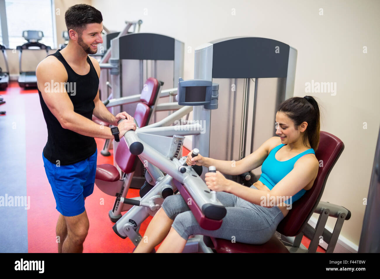 Smiling man sitting in gym hi-res stock photography and images - Alamy