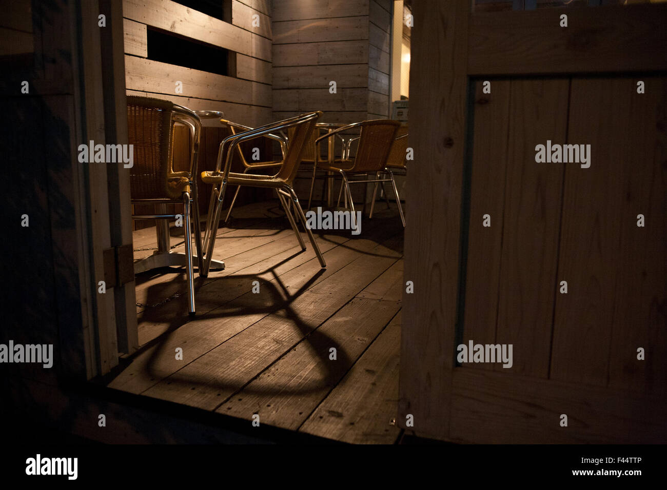 Coffee house interior natural wood light and shadow Stock Photo - Alamy