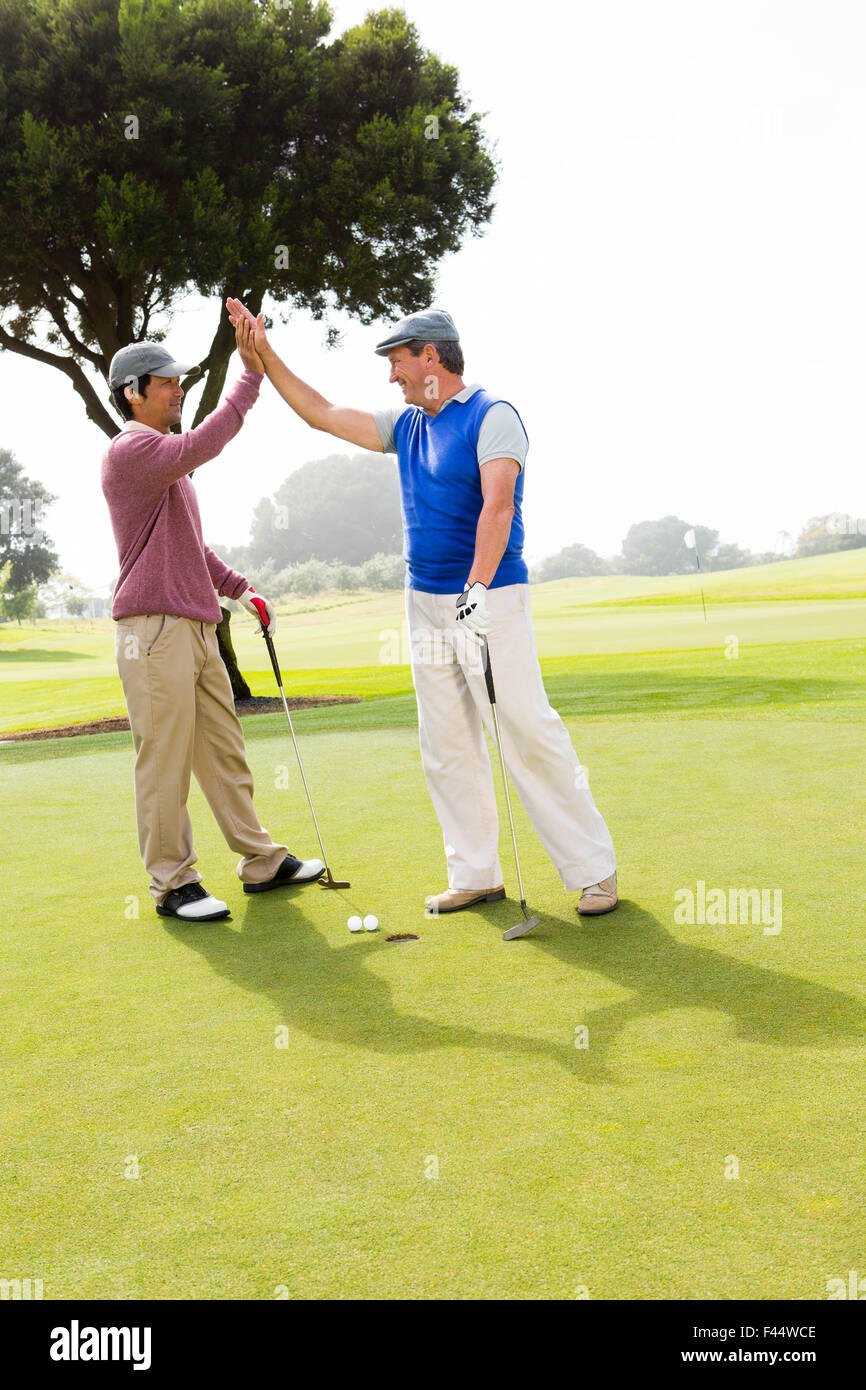 Friends High Fiving High Resolution Stock Photography and Images - Alamy