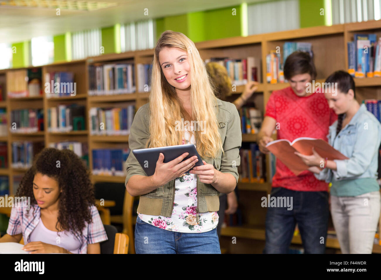 College students in library Stock Photo - Alamy