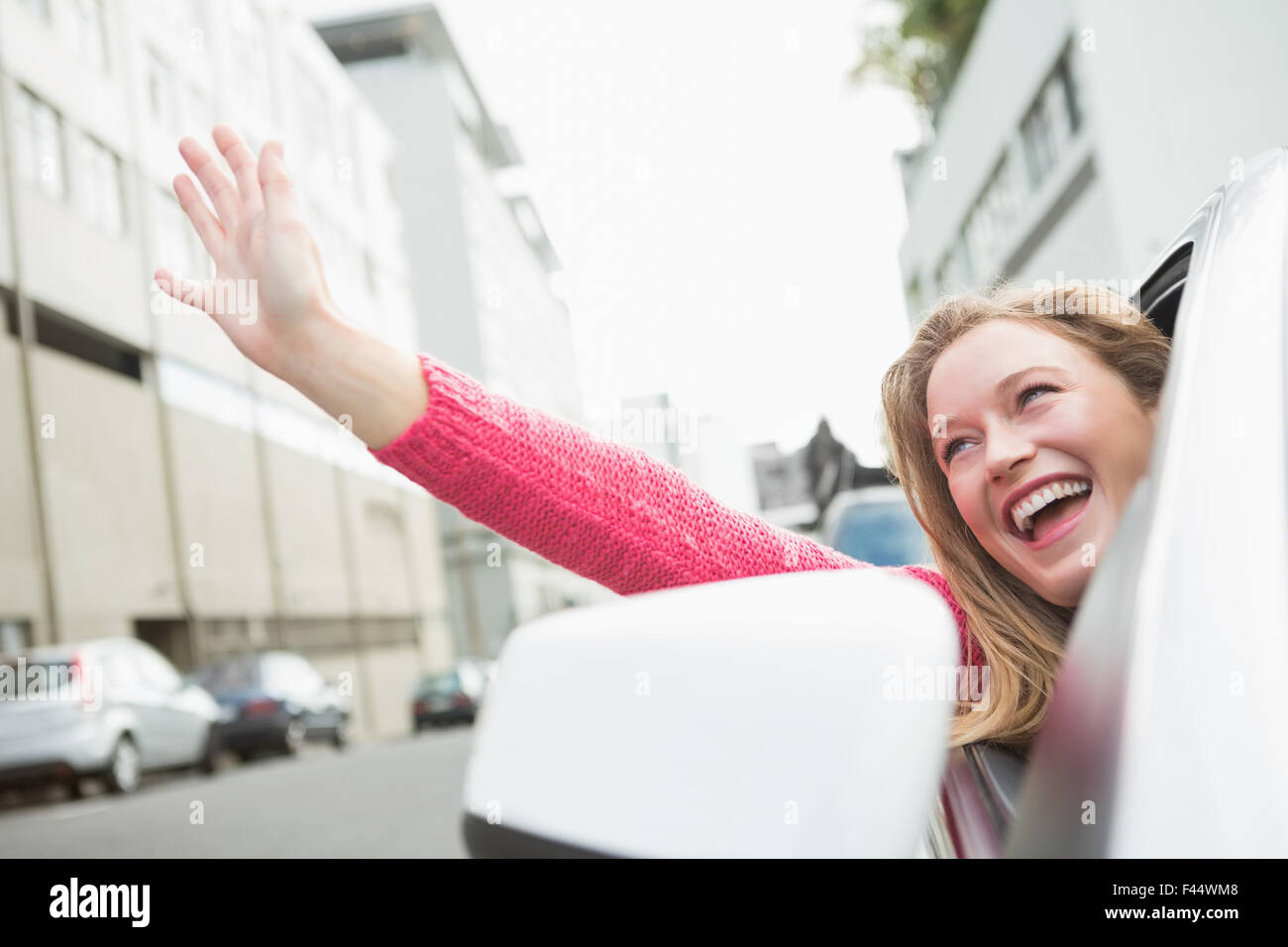 Woman and driver waving hi-res stock photography and images - Alamy