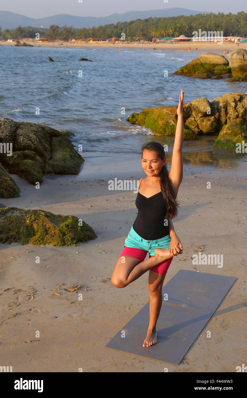 Asian woman practicing doing yoga hi-res stock photography and images ...